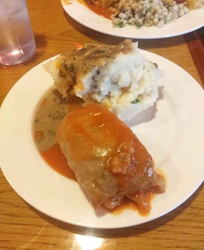 That golabki is practically begging you to unroll it and discover the meat-and-rice treasure hidden inside its cabbage embrace.