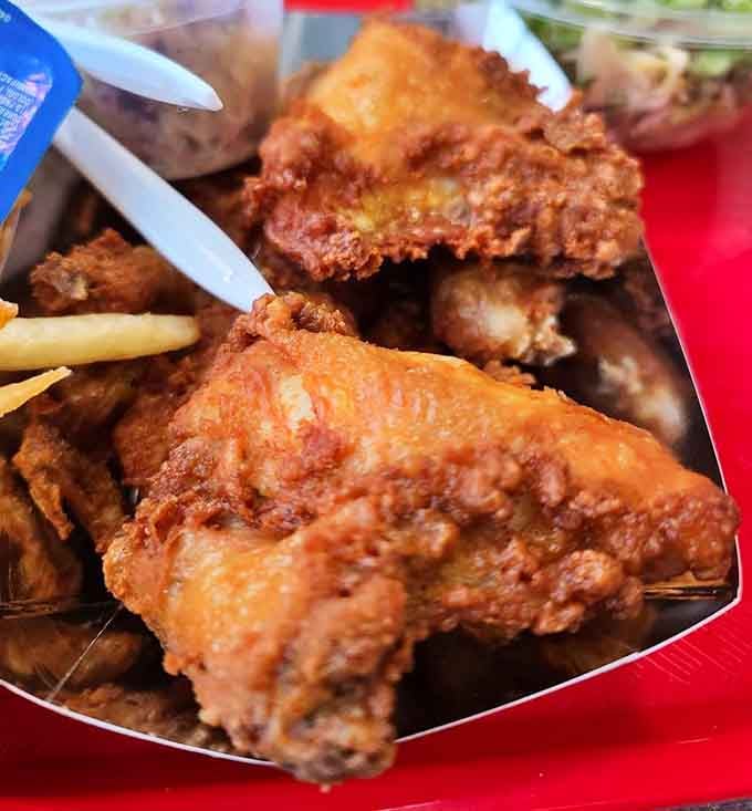 Golden, crispy, and impossibly juicy, this fried chicken could make a vegetarian reconsider their life choices.