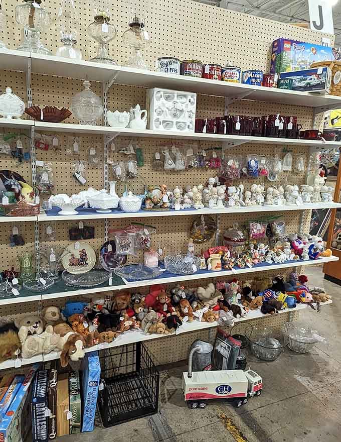 From Depression glass to stuffed bears, this shelf is basically a time capsule of American childhood wrapped in nostalgia.
