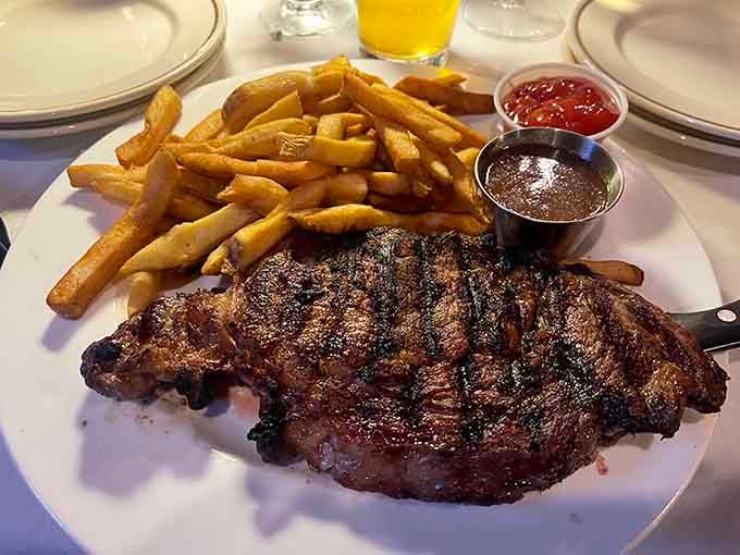 That's a serious piece of meat with fries that actually look hand-cut, not freezer-born like most restaurants serve.