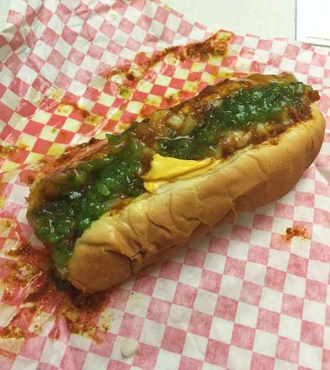 The neon-green relish on this chili cheese dog proves that sometimes the most colorful foods taste the absolute best.