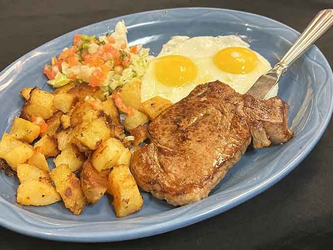 A perfectly cooked steak with sunny-side eggs proves breakfast can be fancy without trying too hard.