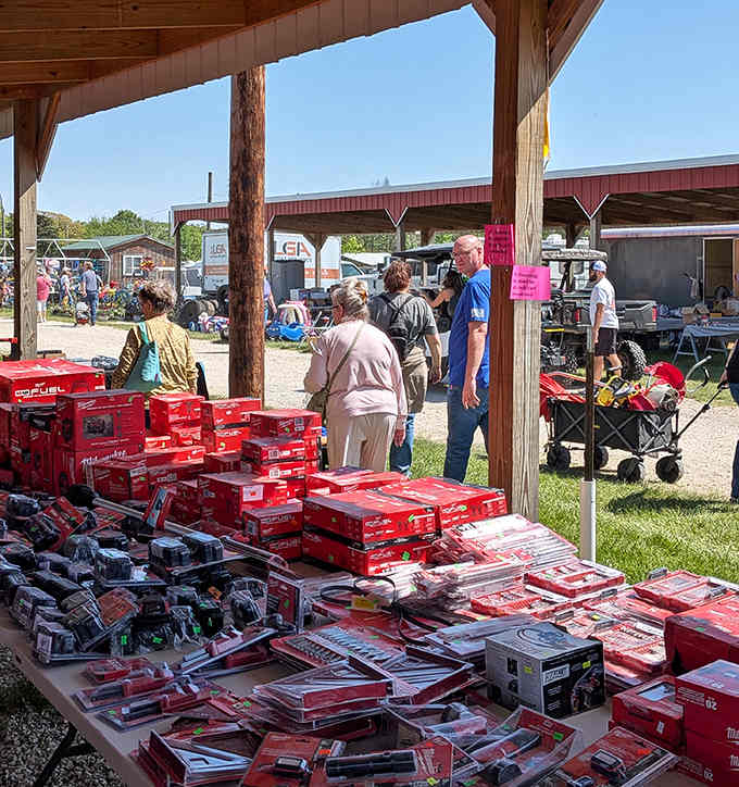 Under the pavilion, shoppers gather like archaeologists examining artifacts, except these treasures come with negotiable price tags and stories.