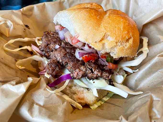 Island flavors meet Midwest hospitality in this handheld masterpiece that defies geographical logic beautifully.