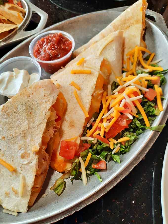 Golden quesadilla triangles stuffed with melted goodness make the perfect shareable starter, or keep them all for yourself.