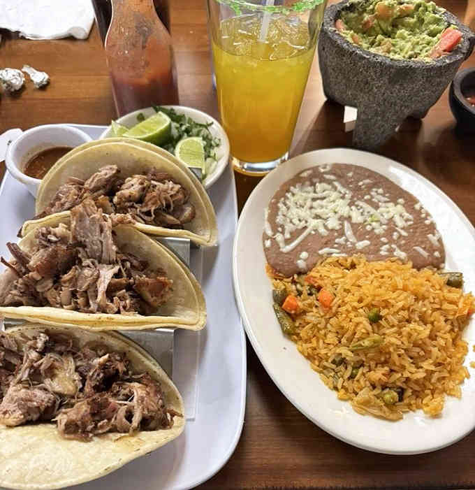 Carnitas tacos so tender, the meat practically whispers sweet nothings as you take each bite.