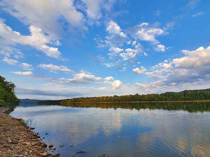 Mirror-perfect reflections on glassy water create the kind of peace money can't buy, just patience can.