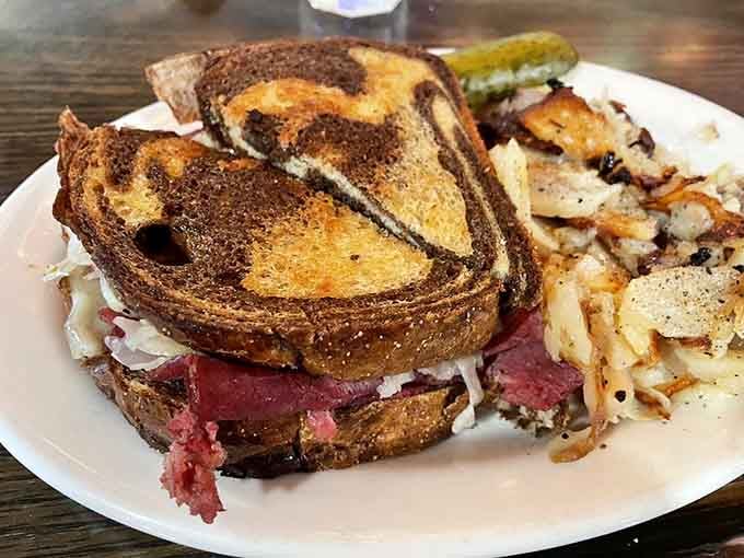That Reuben on marbled rye with crispy German fries proves sandwiches can be works of art too, folks.