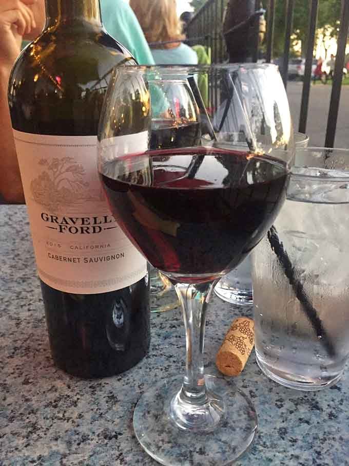 Nothing says civilized dining quite like a proper glass of Cabernet catching the golden hour light.