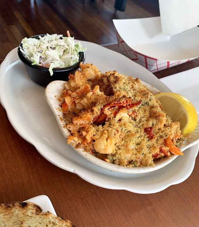 The Lazy Man Lobster Pie arrives bubbling with tender lobster meat that requires zero work and delivers maximum joy.