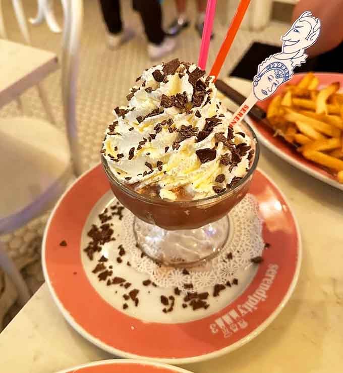 The legendary Frrrozen Hot Chocolate towers like a chocolatey monument to everything wonderful about ignoring portion control completely and joyfully.