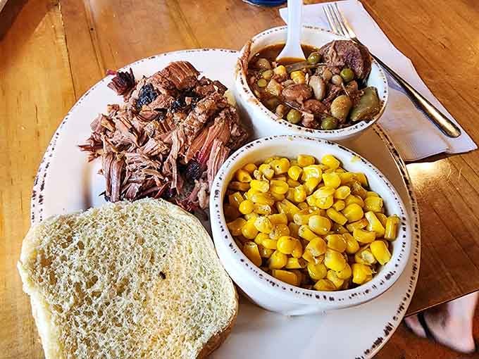 Pulled pork piled high with golden corn and beans; this is what comfort looks like on a plate.