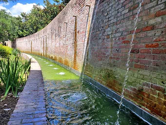 Water cascading down weathered brick creates a soothing soundtrack that makes you forget your phone exists for a while.