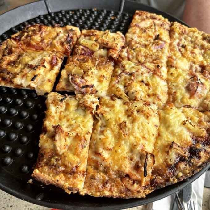 BBQ Chicken Pizza with that golden, caramelized crust &ndash; because sometimes fusion actually works when you're not trying too hard.