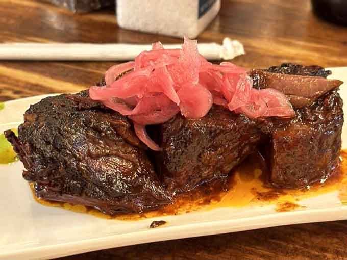 These burnt ends glisten like edible jewels, proving that sometimes the best things come in caramelized packages.