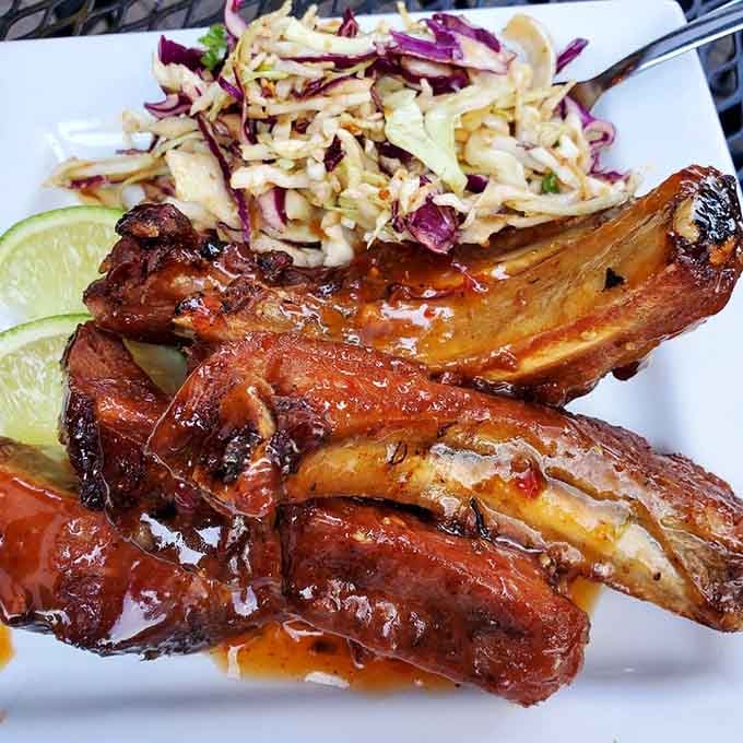 Those Thai Market Ribs glisten like treasure, sticky and sweet with just enough heat to keep things interesting.