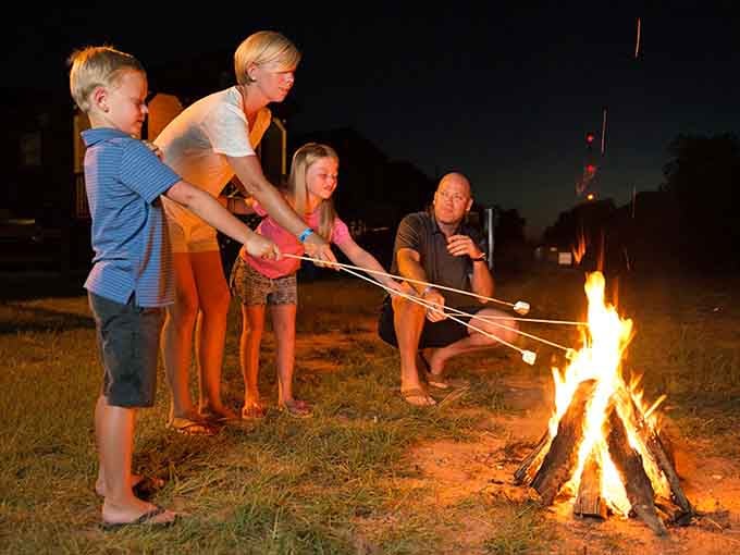 Nothing says "family bonding" quite like watching marshmallows catch fire while pretending you meant to do that.