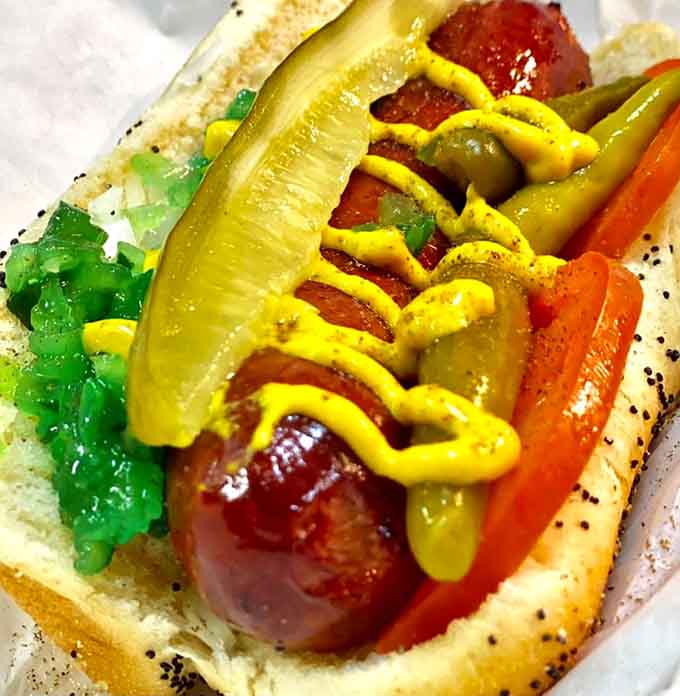The Chicago dog's colorful cousin arrives dressed to impress and ready to challenge your napkin supply.