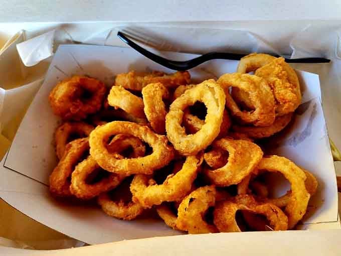 Fried calamari so tender it practically melts, proving that simple preparations often beat fancy techniques every single time.