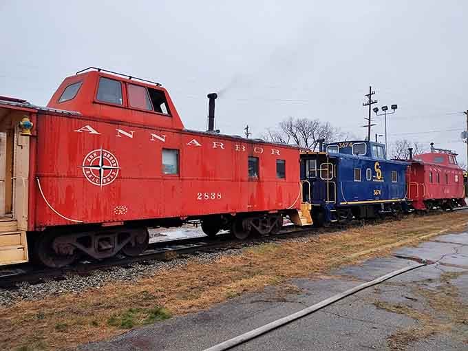 That bright red Ann Arbor Railroad caboose once housed crews who watched America roll by from the back of the train.