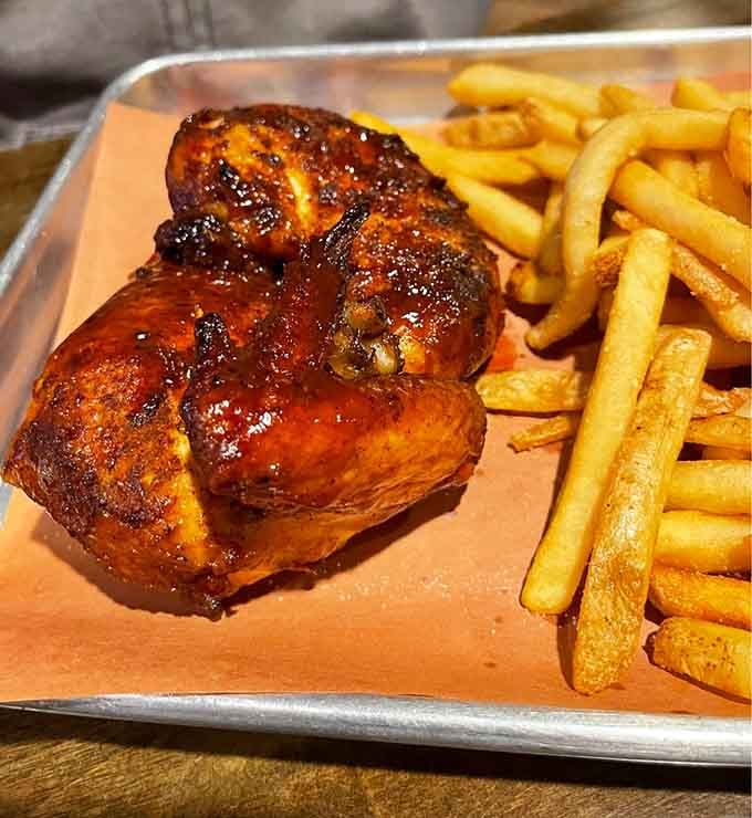 Glazed to perfection and served with fries, this chicken proves that simple done right beats fancy done wrong.