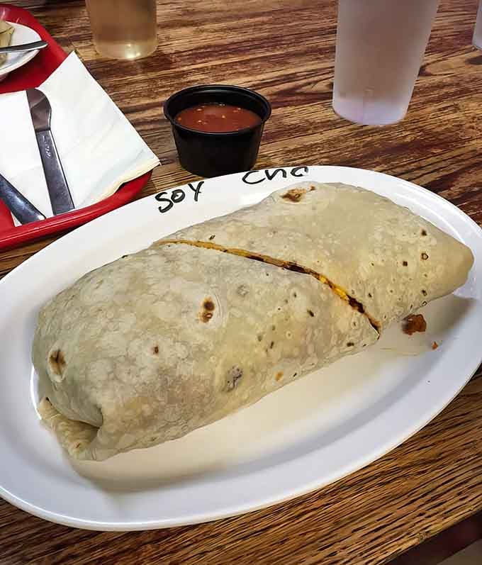 This breakfast burrito could double as a life raft, proving that morning meals here mean serious business.