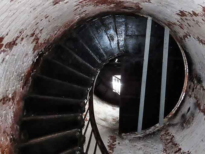 These spiral stairs have witnessed centuries of keepers climbing toward duty, one step at a time.