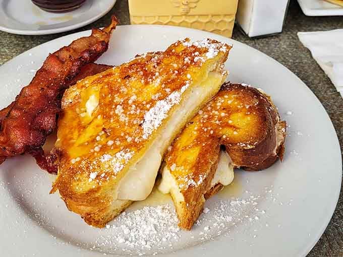 Stuffed French toast with bacon that's basically breakfast's answer to winning the lottery, only more delicious and guaranteed.