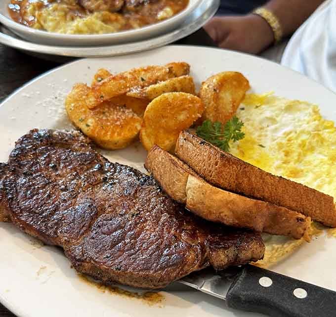 That perfectly cooked steak with eggs proves brunch doesn't have to mean choosing between breakfast and a real meal.
