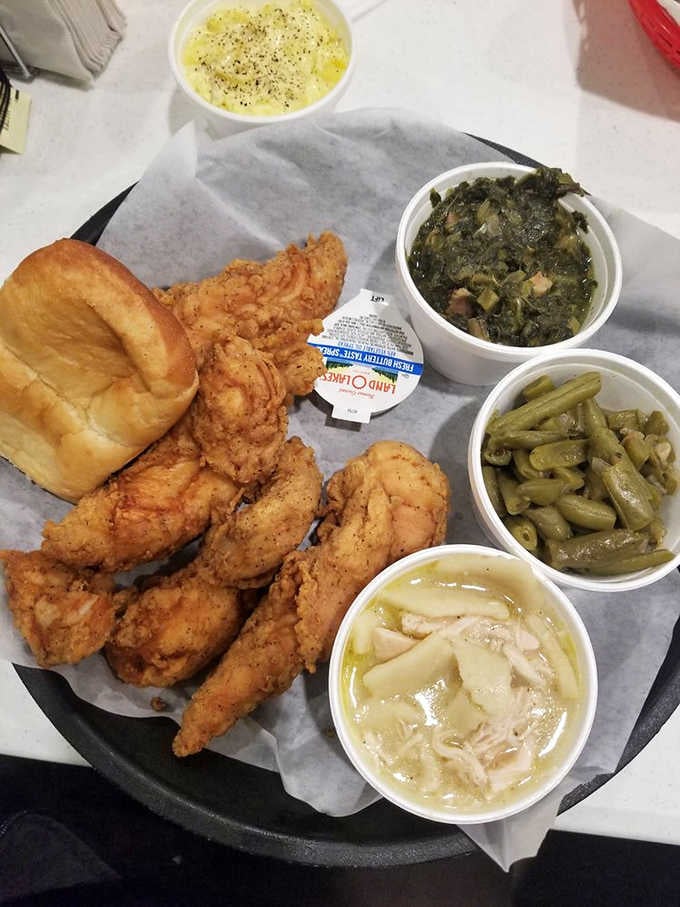 Crispy chicken fingers with collard greens and creamy sides prove that simple done right beats fancy every time.