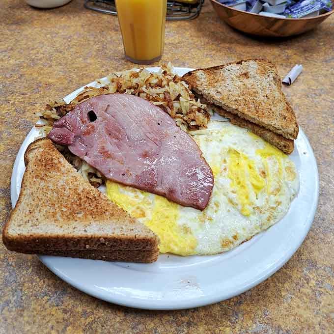 Classic ham and eggs done right, proving that sometimes the simple pleasures are the most satisfying ones around.