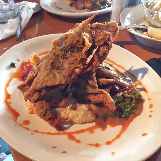 Soft shell crabs piled high and perfectly fried, because sometimes the best things in life require getting your hands dirty.