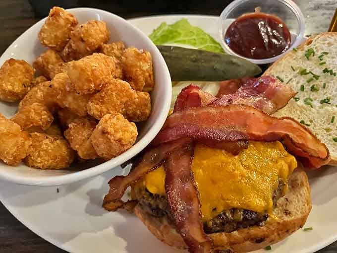 This bacon cheeseburger comes with tater tots because sometimes the classics need equally classic sidekicks for perfection.