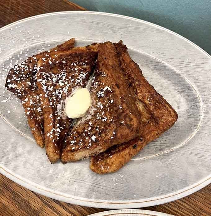 French toast dusted with powdered sugar and topped with butter: simple perfection that needs no introduction or apology whatsoever.