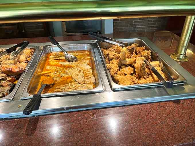 The buffet line gleams with promise: tender chicken, flaky fish, and enough variety to make decisions deliciously difficult.