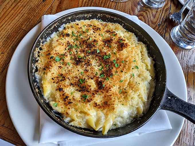 Mac and cheese elevated to an art form, proving comfort food deserves a spot at the fancy table.