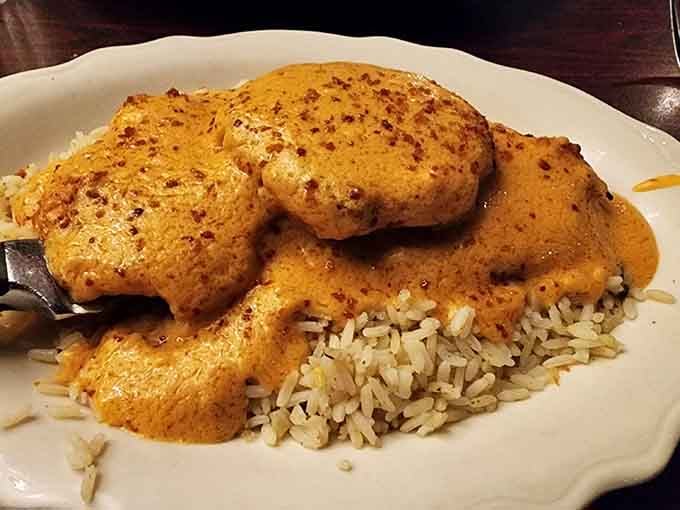 Golden-crusted perfection over rice proves that sometimes the best meals are the ones you didn't know you needed until they arrived.