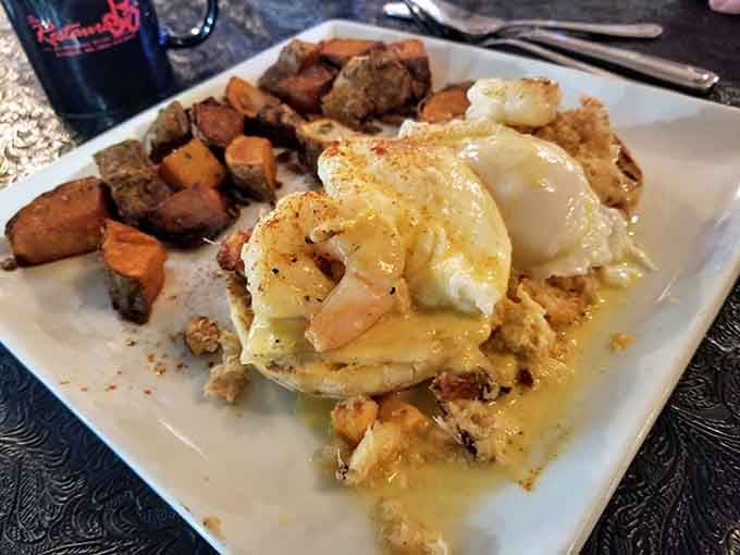 Eggs Benedict gets the seafood treatment with perfectly poached eggs cascading over fresh catch and roasted potatoes.