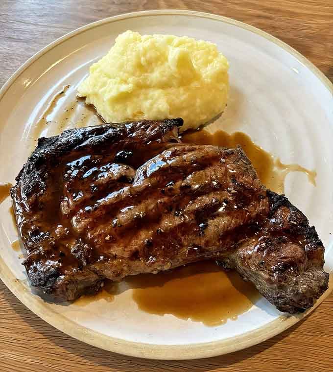 When your ribeye comes with a char this perfect, you understand why people drive through questionable GPS directions.