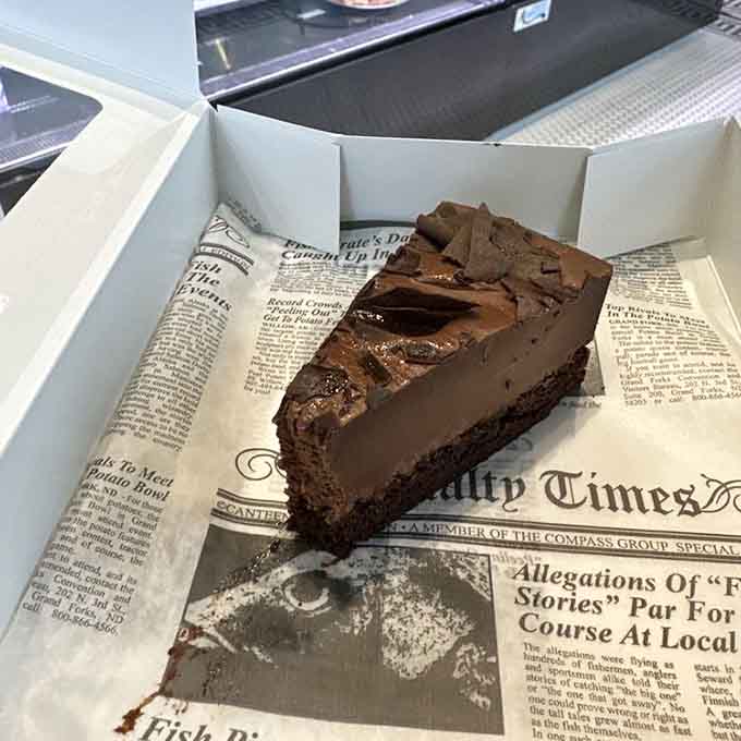 Chocolate mousse cake that's so rich it should probably file taxes in a higher bracket than you.