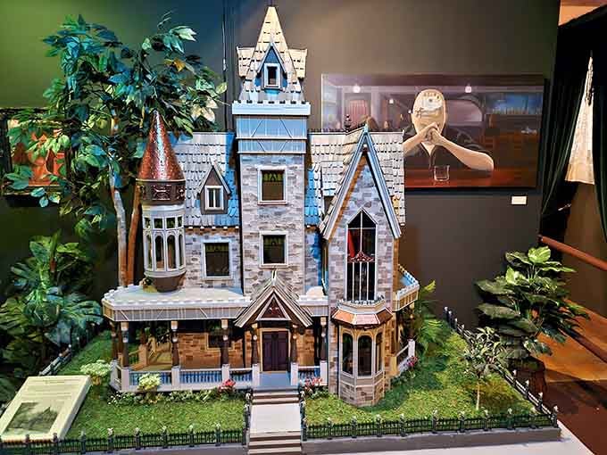 This intricate Victorian dollhouse looks like the Addams Family's summer home, complete with Gothic architectural details.