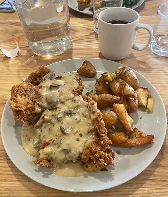 That crispy coating and mushroom gravy deserve their own fan club, possibly with membership cards and everything.