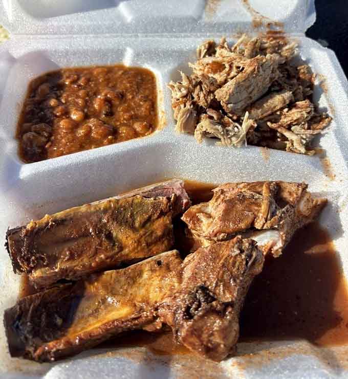 Ribs, pulled pork, and beans on one plate: the holy trinity of western Kentucky happiness.
