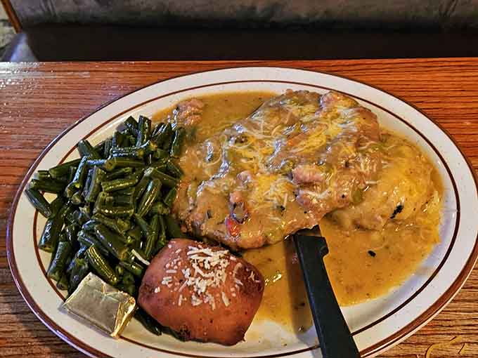 Golden-fried perfection meets creamy gravy in this chicken fried steak that understands your deepest comfort food desires.