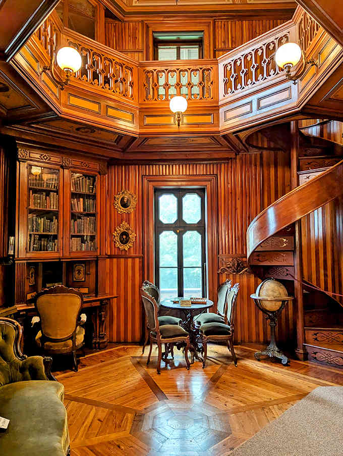 A library where the woodwork alone could teach a masterclass in craftsmanship and patience.