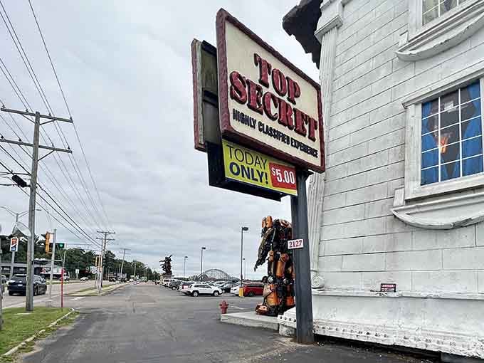 The sign promises classified secrets, and that robot sentry suggests they're taking security very seriously here.