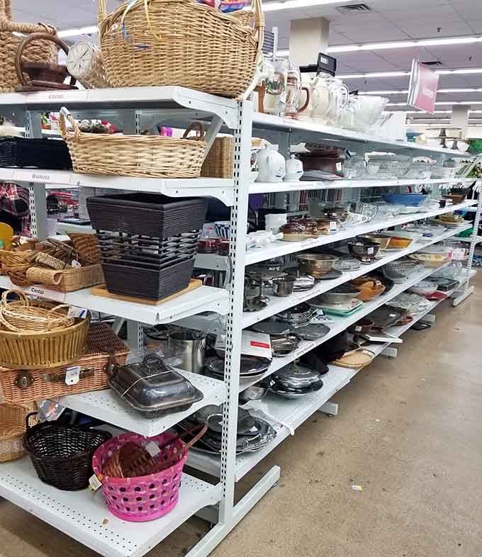 Wicker baskets and kitchen essentials organized like a treasure map, each shelf hiding potential household heroes.