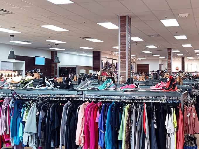 Racks stretching into the distance like a rainbow made of affordable fashion choices and excellent life decisions.