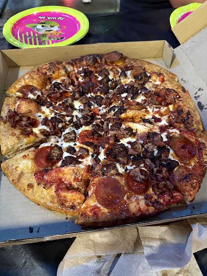 Pizza loaded with enough toppings to fuel hours of jumping, because carbs are basically athletic performance enhancers here.