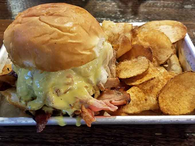 When three types of pork unite on one bun, you've found yourself a sandwich worth writing home about.